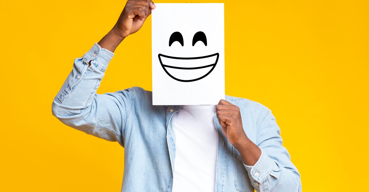 Grinsender Smiley: Bedeutung & zum Kopieren
